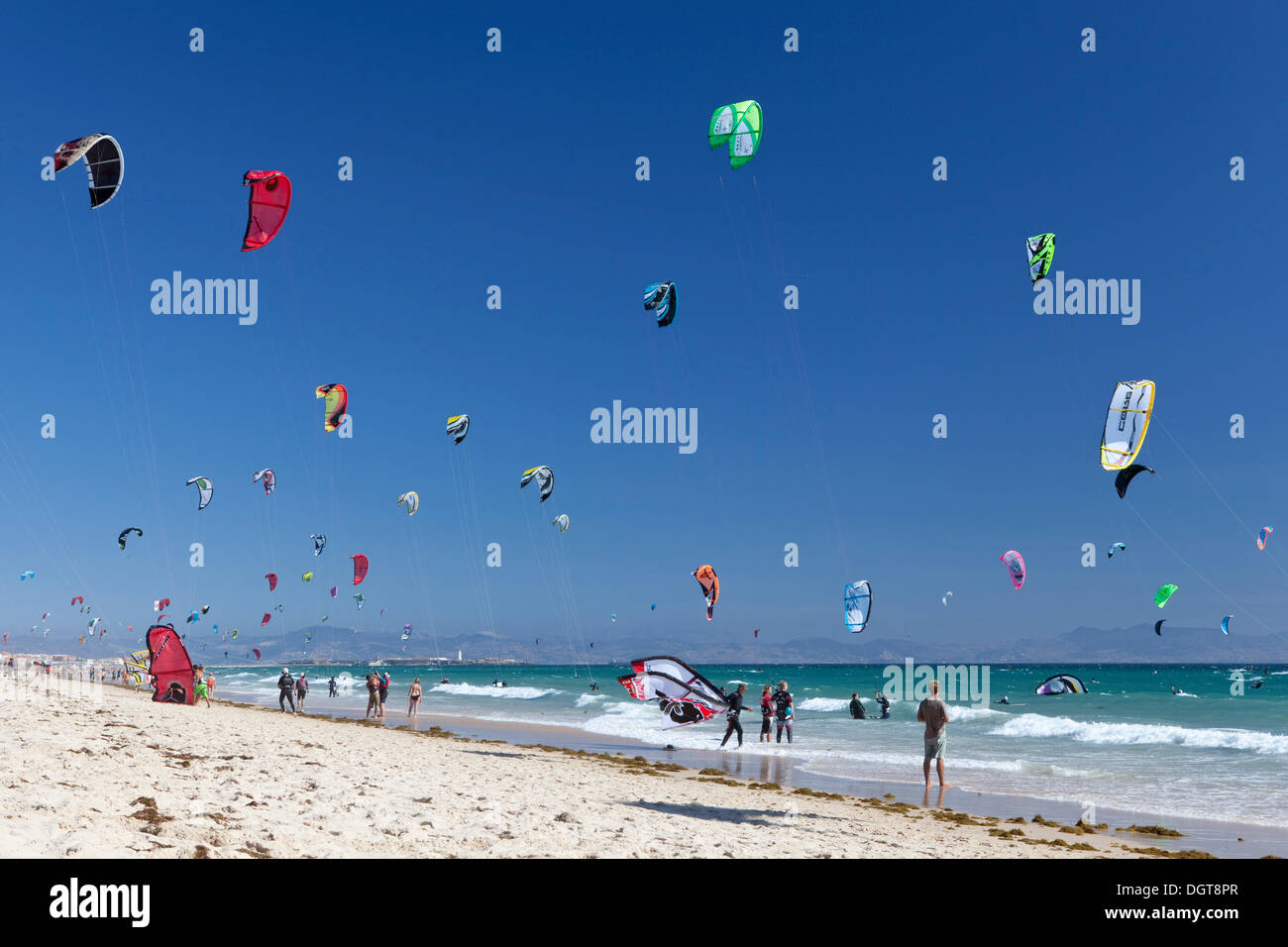 Beach and sky with lots of colorful traction kites of kitesurfers, Rio ...