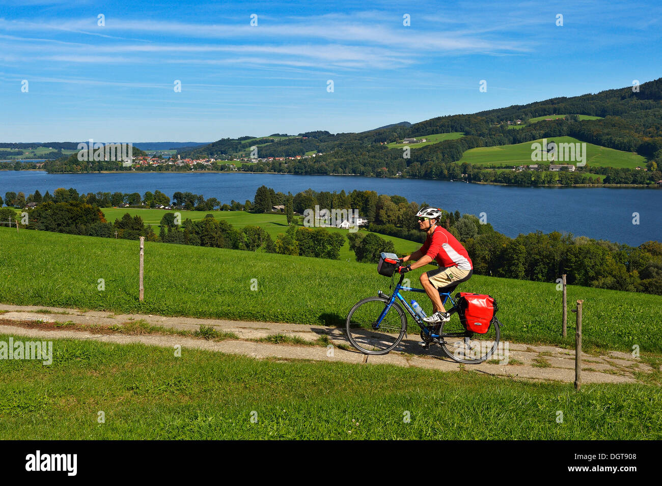 Cyclist at Obertrumer See Lake, Salzburg Lake District, Salzburg State ...