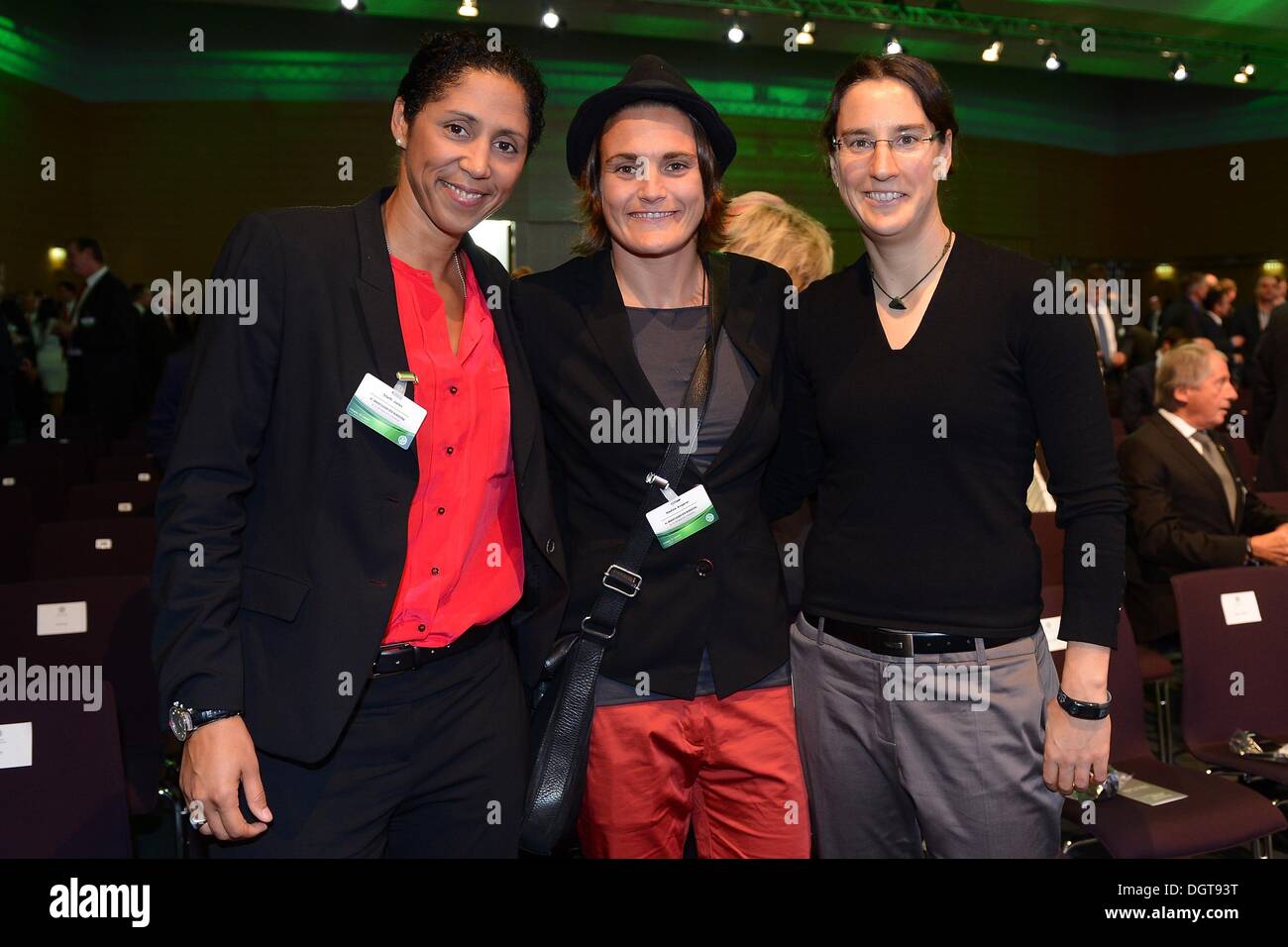Nuremberg, Germany. 24th Oct, 2013. Former team mates Steffi Jones (l ...