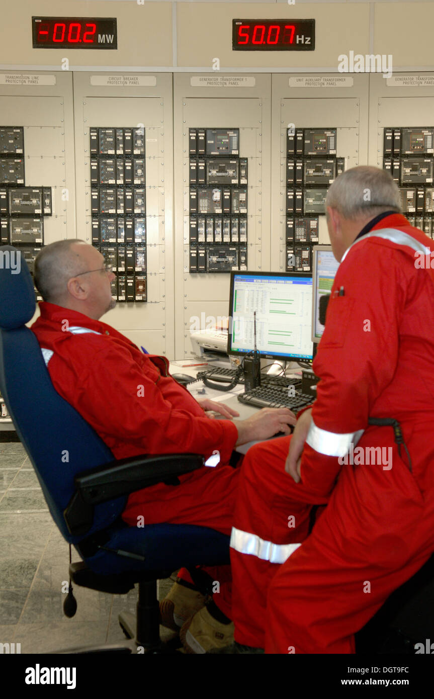 Technicians discussing operations at Barry Power Station owned by ...