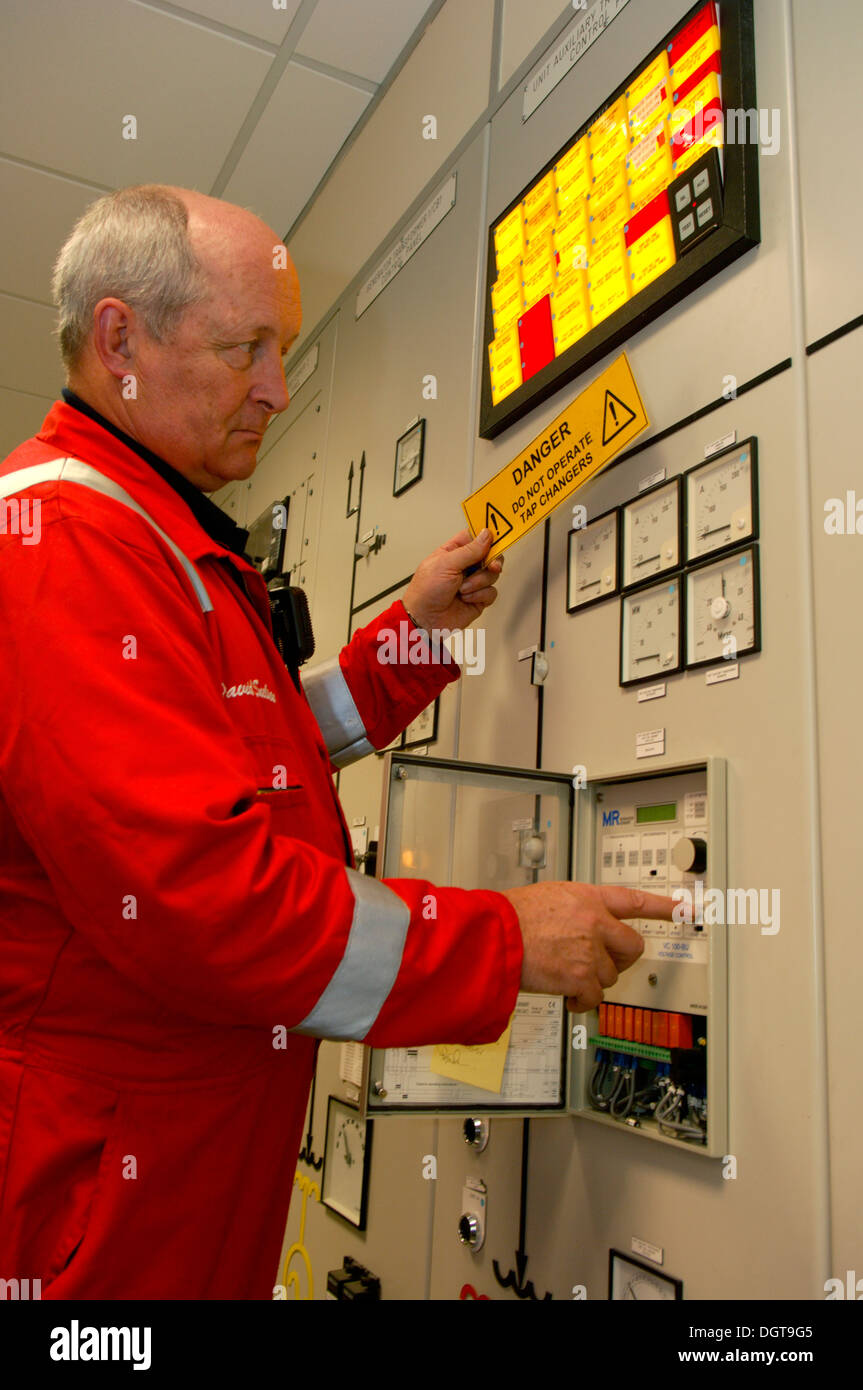 Technician operating tapp changers at Barry Power Station owned by ...