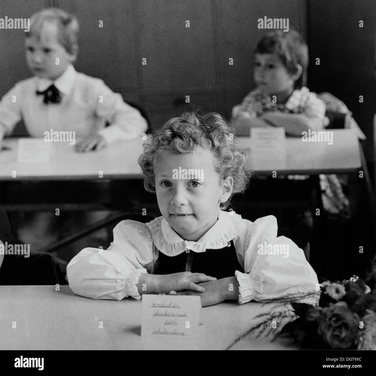 Children at their first day of school, East Germany, DDR about 1984 ...