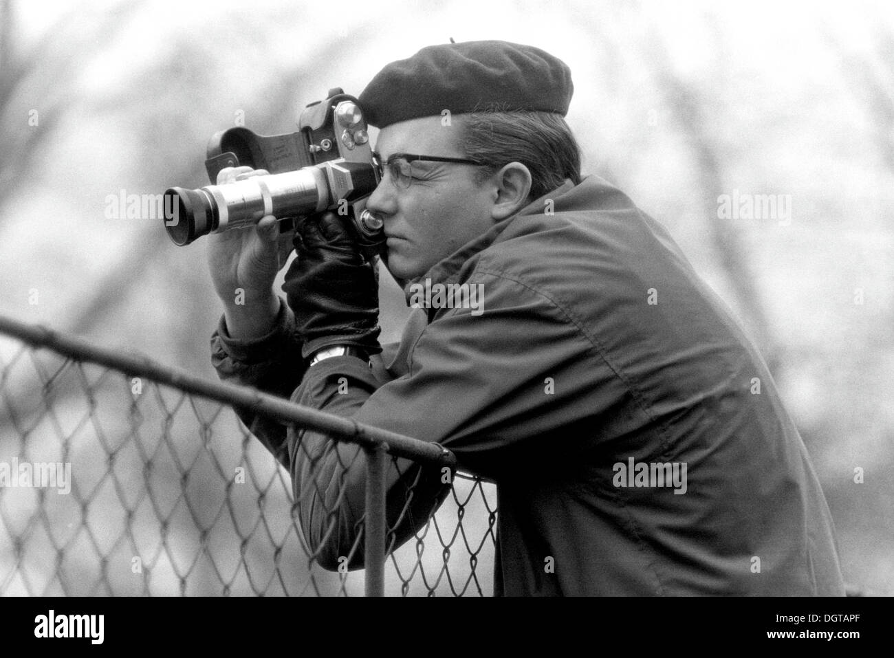 Young man taking pictures with a camera, about 1968, Leipzig, GDR ...