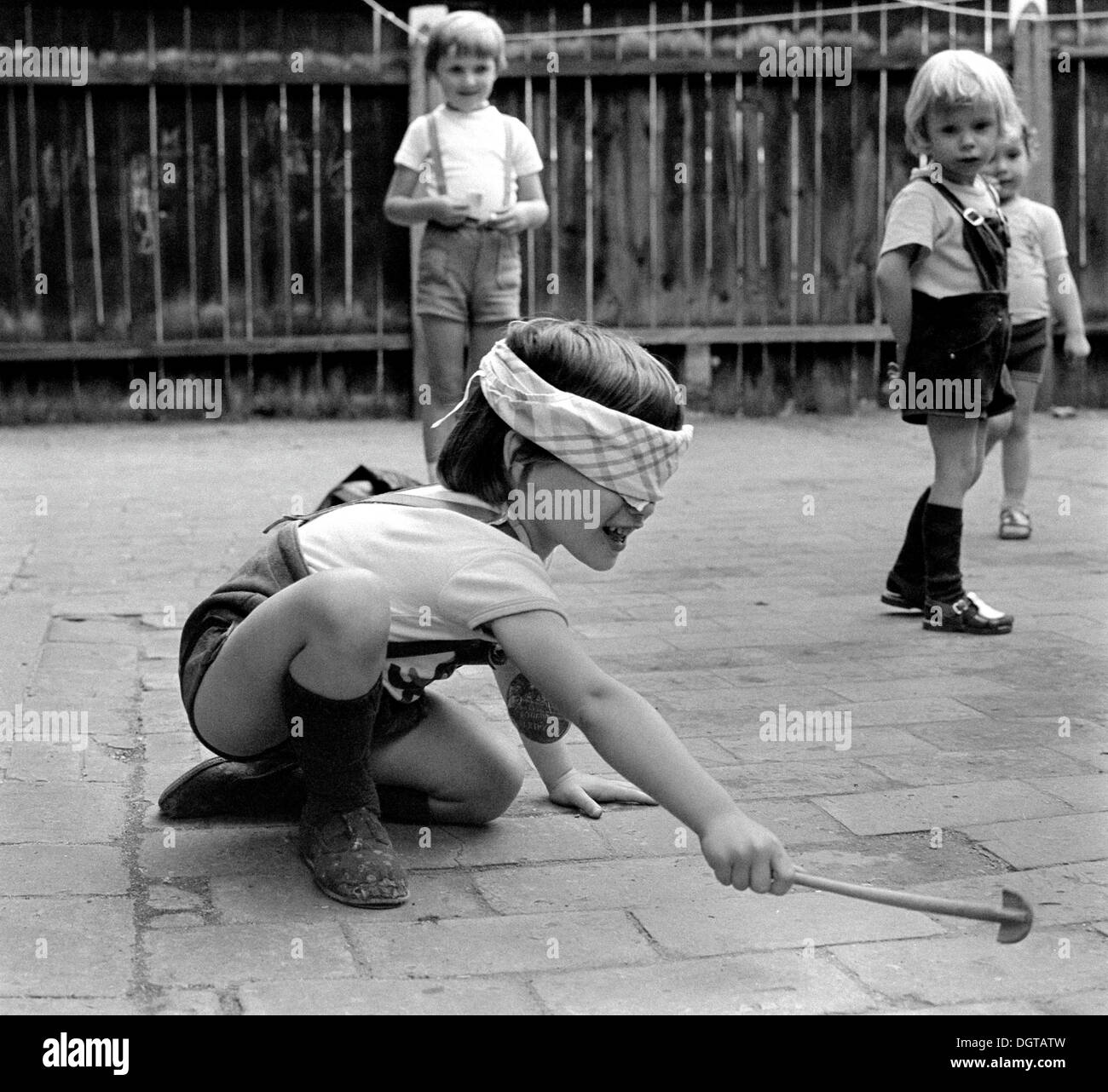 Children playing blind man's buff, Leipzig, East Germany, about 1976 ...