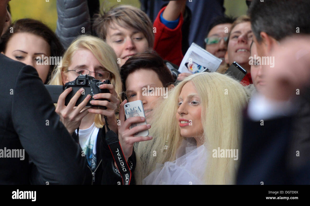 Berlin, German. 25th Oct, 2013. Lady Gaga leaves the Ritz Carlton in ...