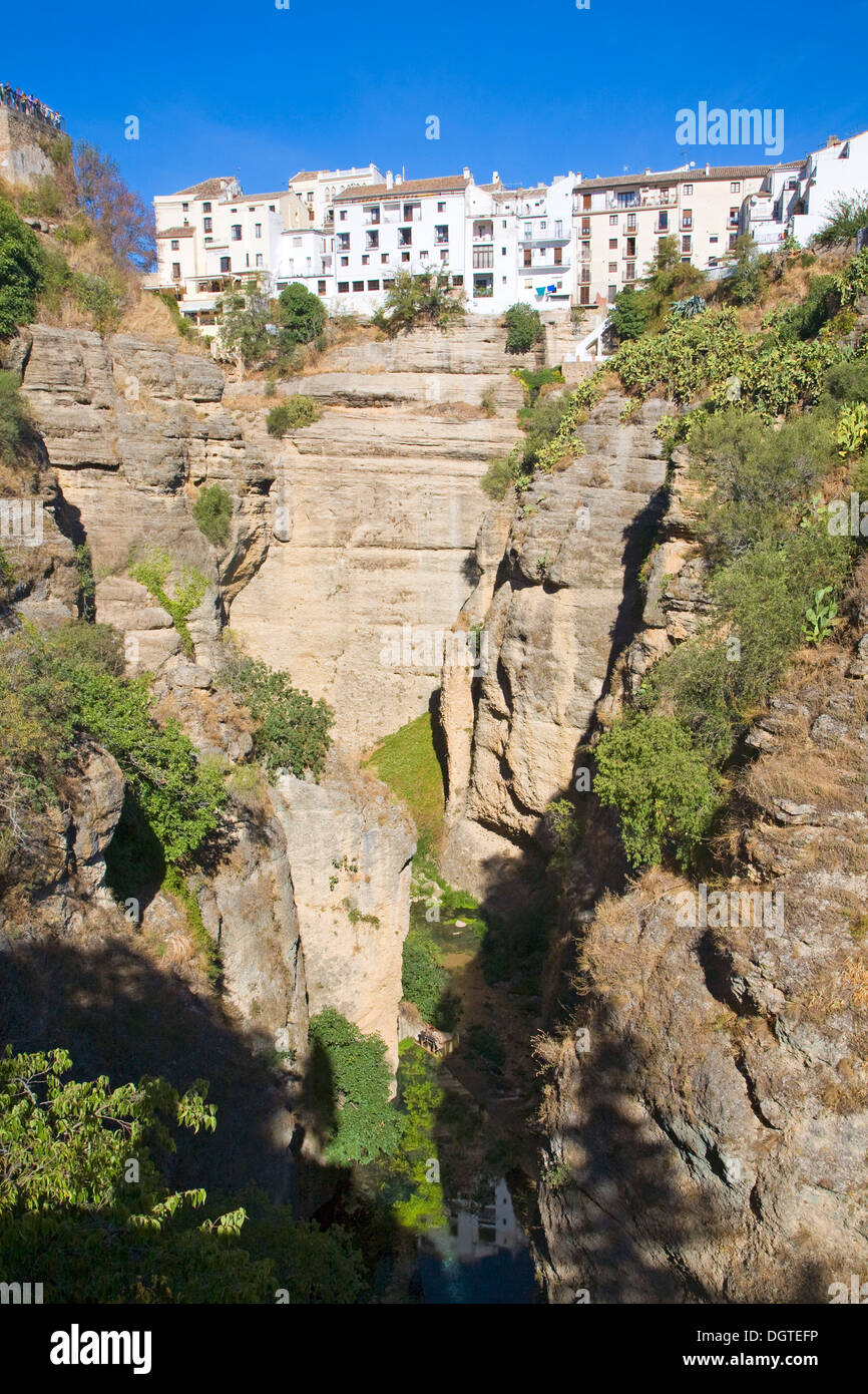 Buildings on cliff top of gorge Rio Guadalevin river Ronda Spain Stock ...