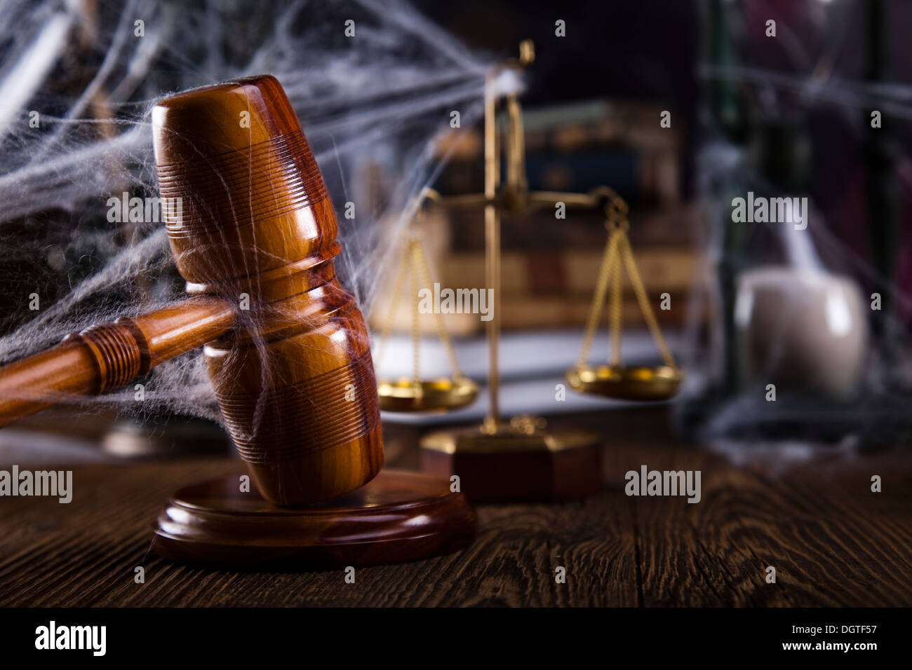 Judges wooden gavel, law scale and law books Stock Photo - Alamy