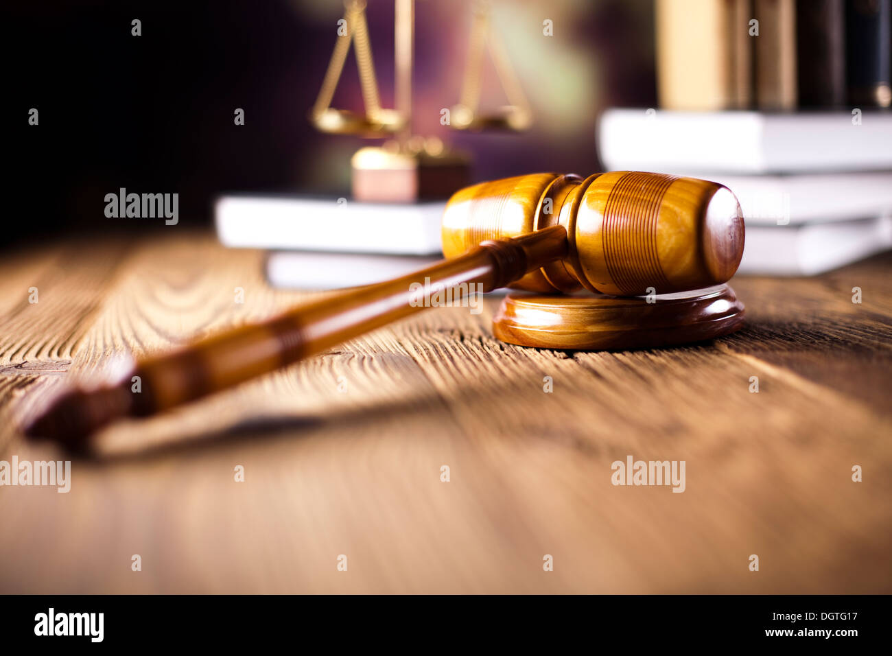 Judges wooden gavel, law scale and law books Stock Photo - Alamy