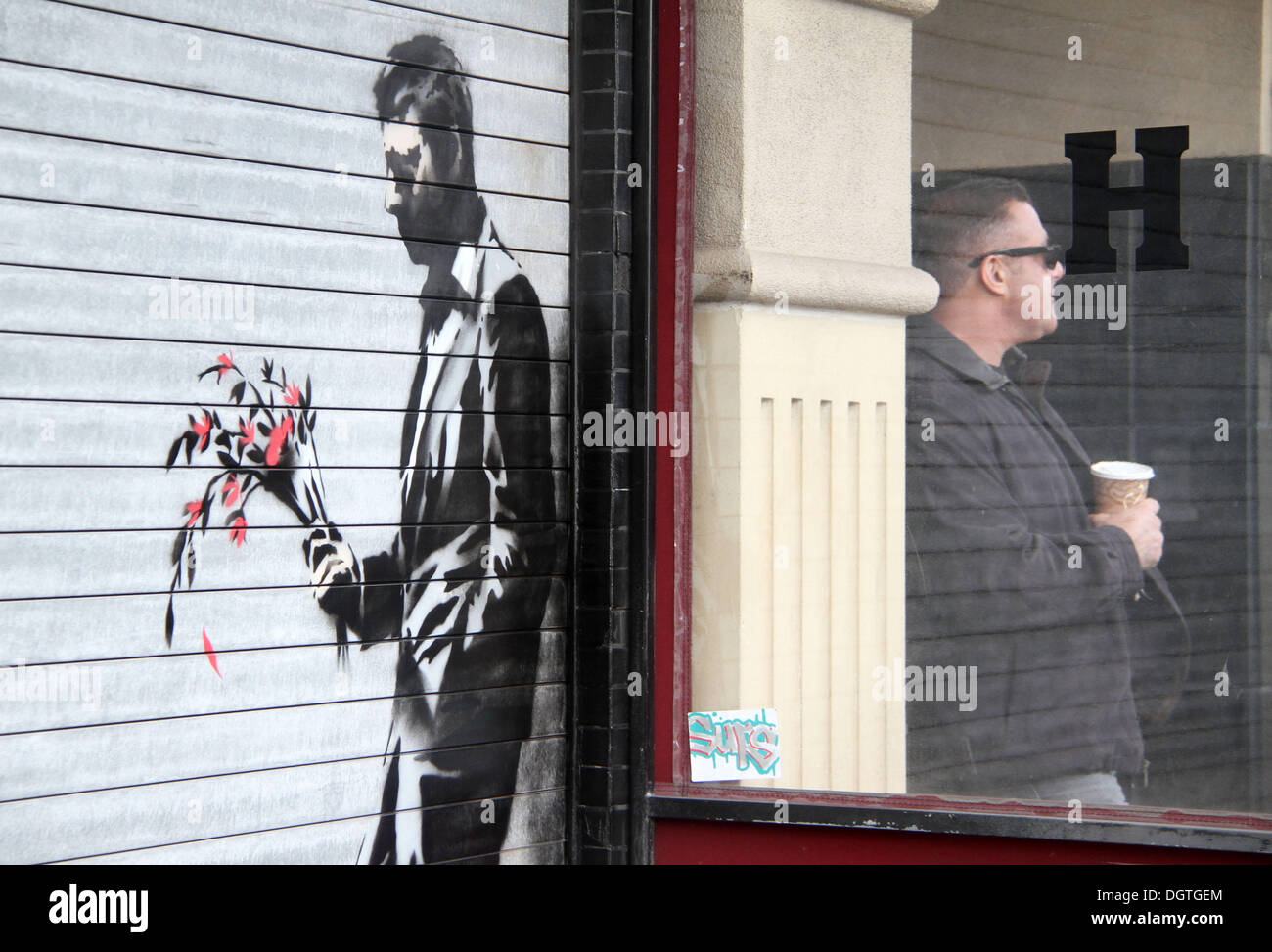 New York, New York, USA. 24th Oct, 2013. A security guard protects ...
