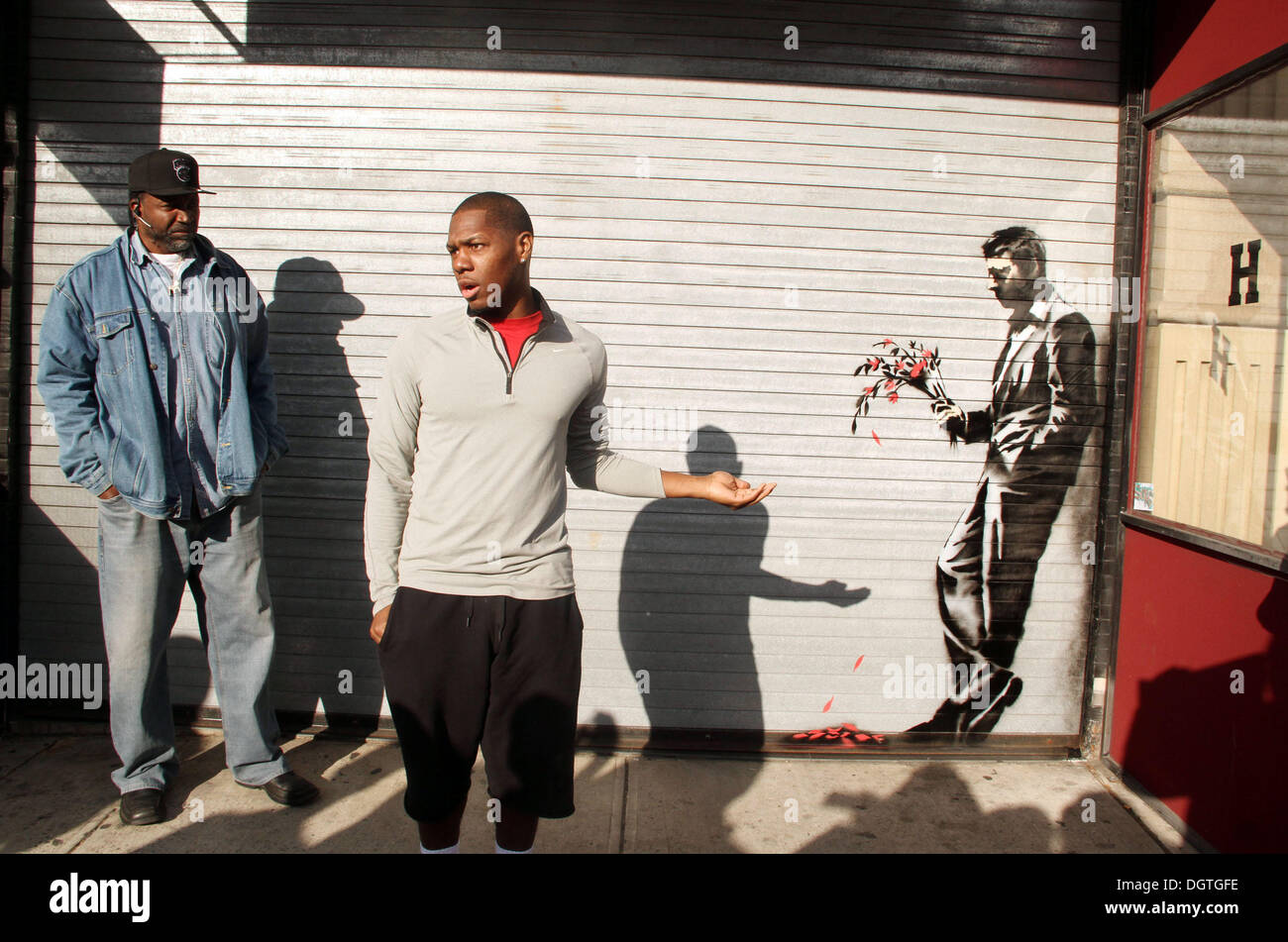 New York, New York, USA. 24th Oct, 2013. A security guard watches, as a ...