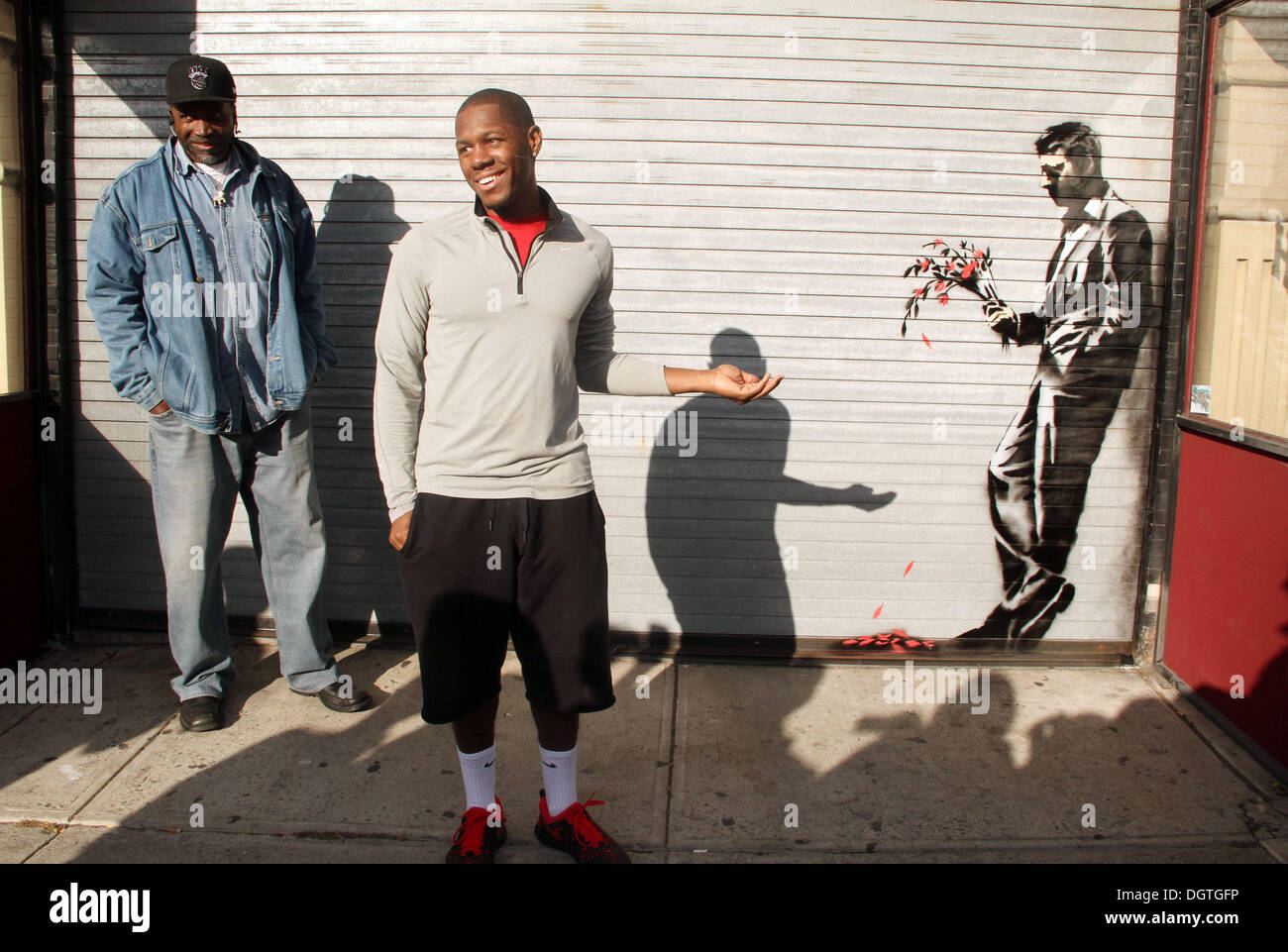 New York, New York, USA. 24th Oct, 2013. A security guard watches, as a ...