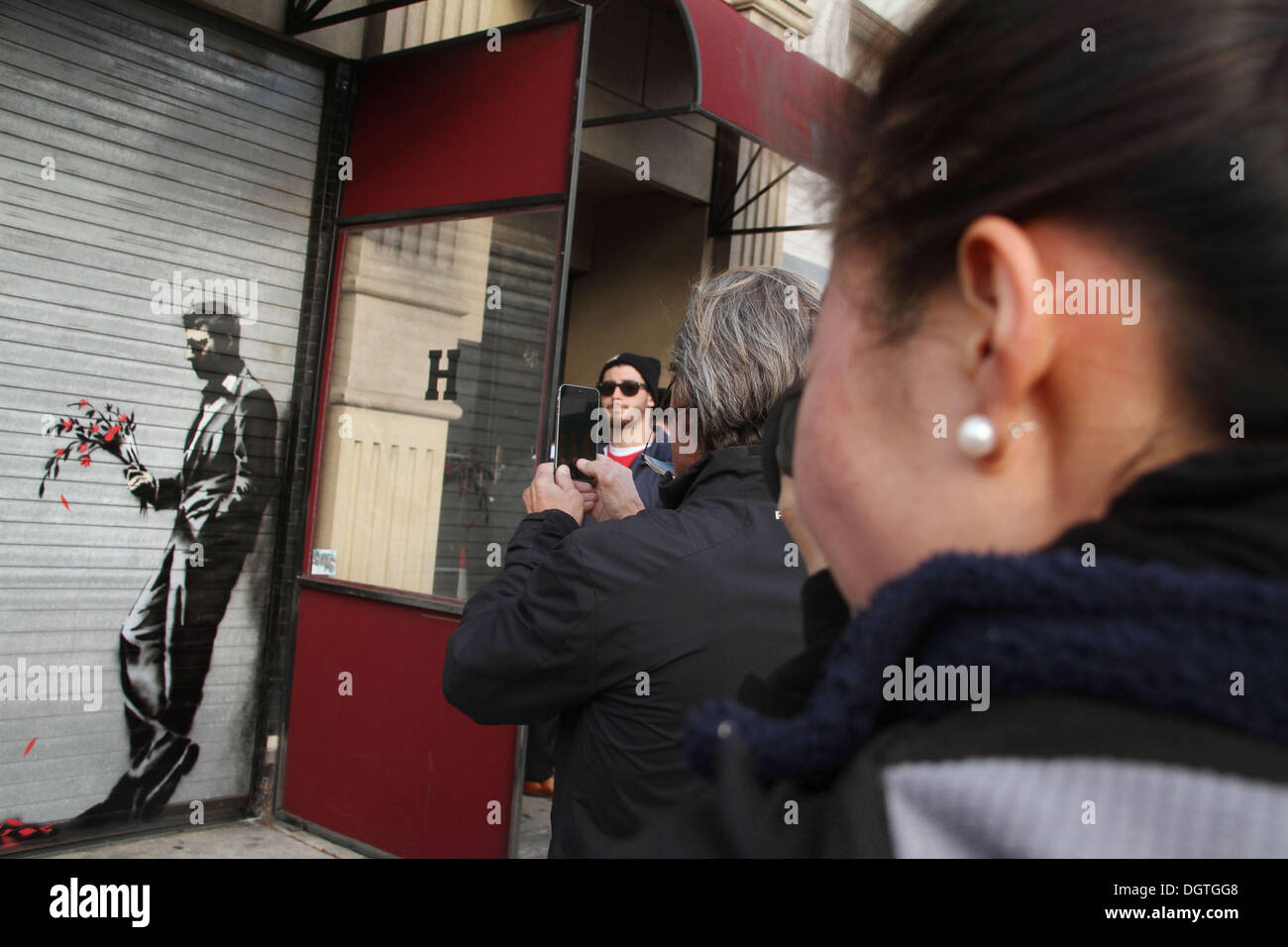 New York, New York, USA. 24th Oct, 2013. A security guard watches as ...