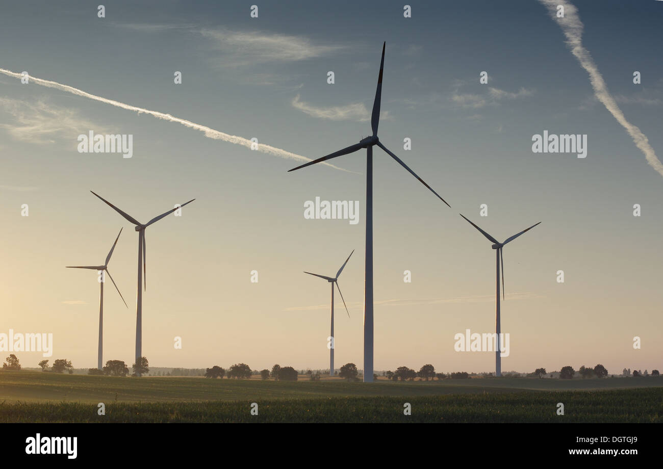 wind turbine on sunset background Stock Photo - Alamy