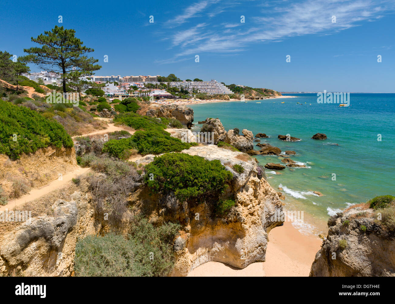 Portugal, the Algarve, a small cove at Praia da Oura showing Clube ...