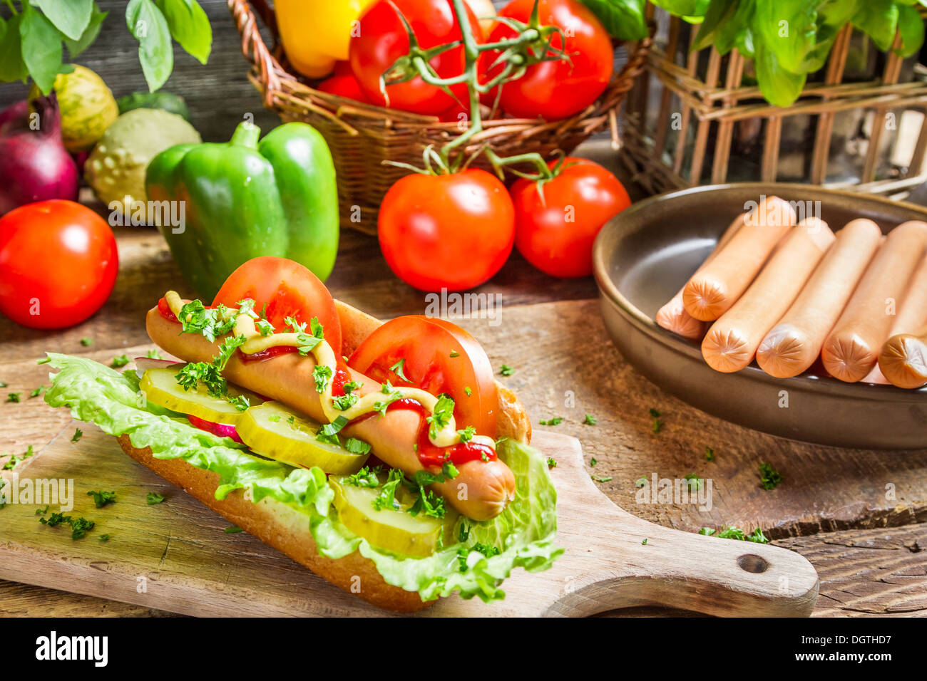 Fresh hot dog with sausage and vegetables Stock Photo - Alamy