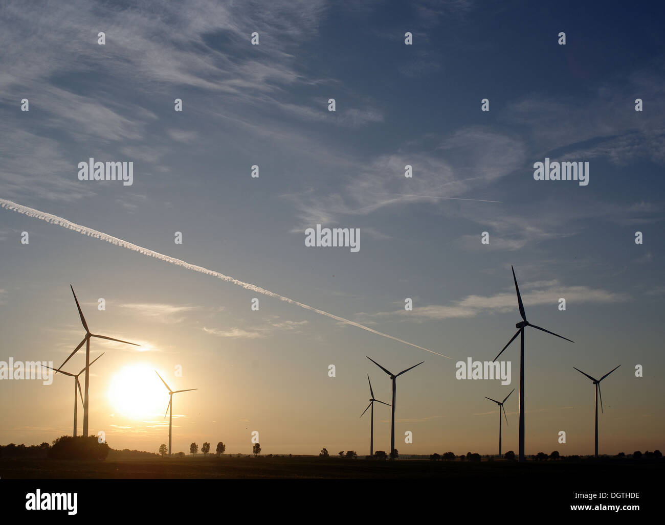 wind turbine on sunset background Stock Photo - Alamy