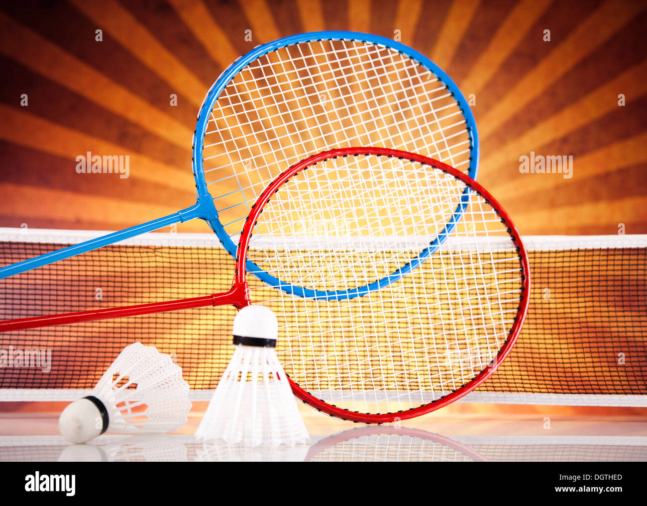 Badminton rackets and shuttlecock, sunshine background Stock Photo - Alamy