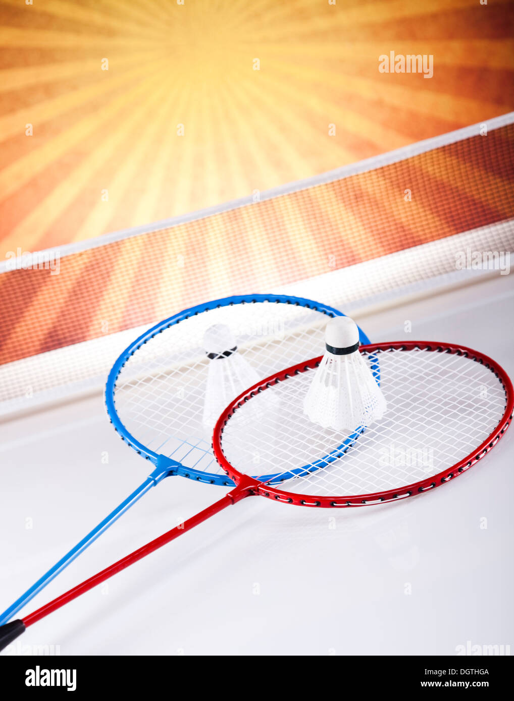 Badminton rackets and shuttlecock, sunshine background Stock Photo - Alamy