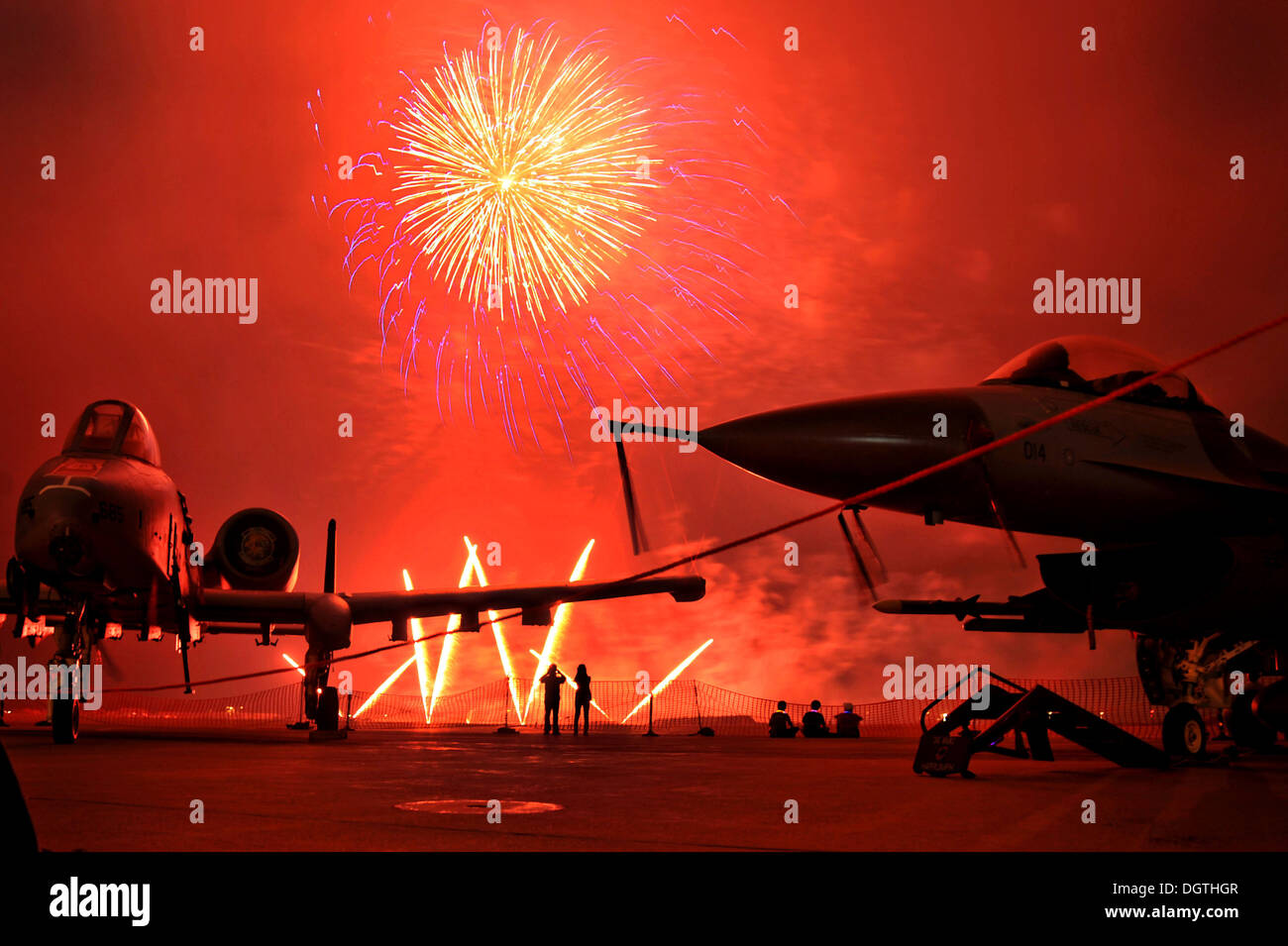 Fireworks explode in the sky behind a U.S. Air Force A-10 Thunderbolt ...