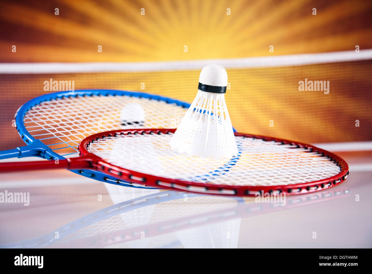 Badminton rackets and shuttlecock, sunshine background Stock Photo - Alamy