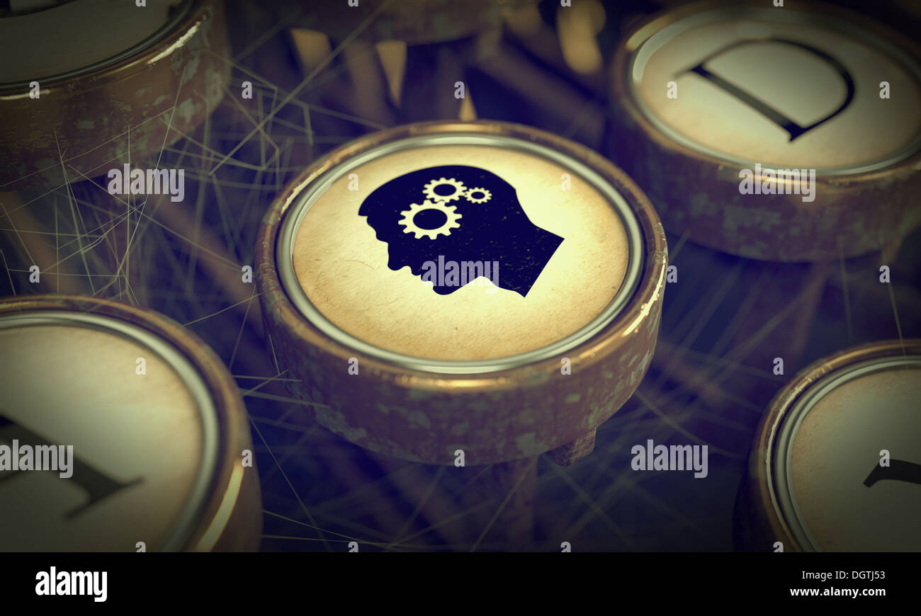 Head With Gears on Grunge Typewriter Key Stock Photo - Alamy