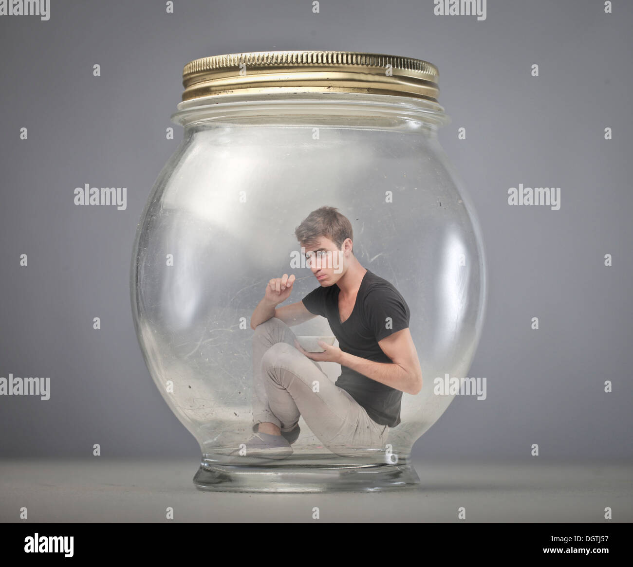 Man trapped glass jar hi-res stock photography and images - Alamy