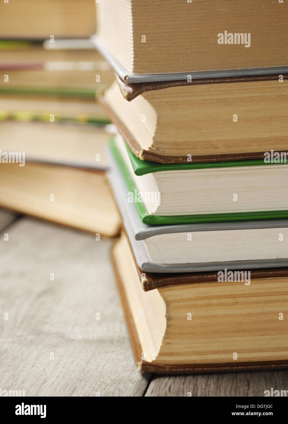 Many books on the table Stock Photo - Alamy