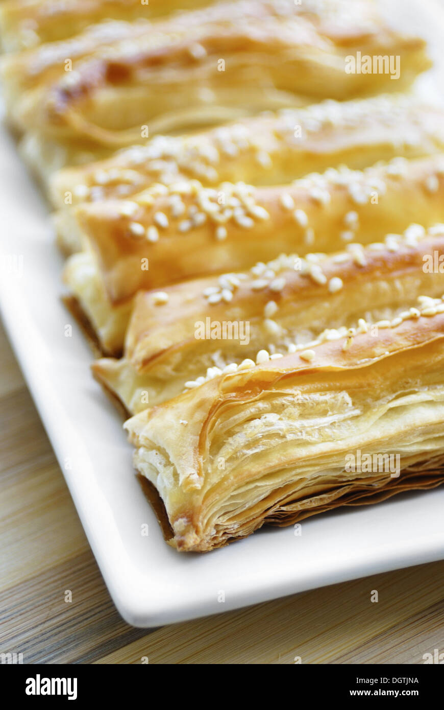 Just baked crunchy puff pastry Stock Photo - Alamy