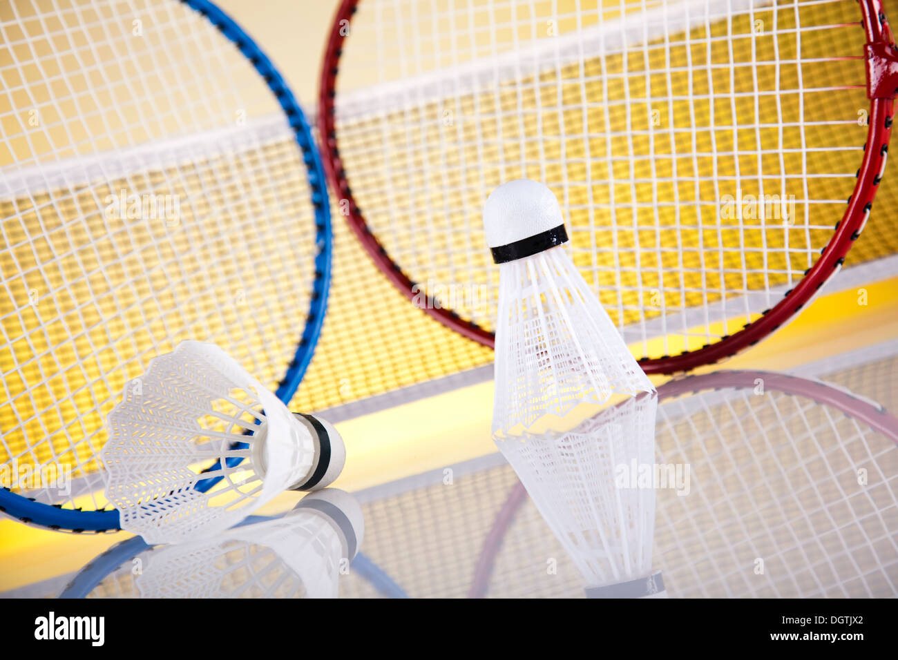 Badminton rackets and shuttlecock, sunshine background Stock Photo - Alamy