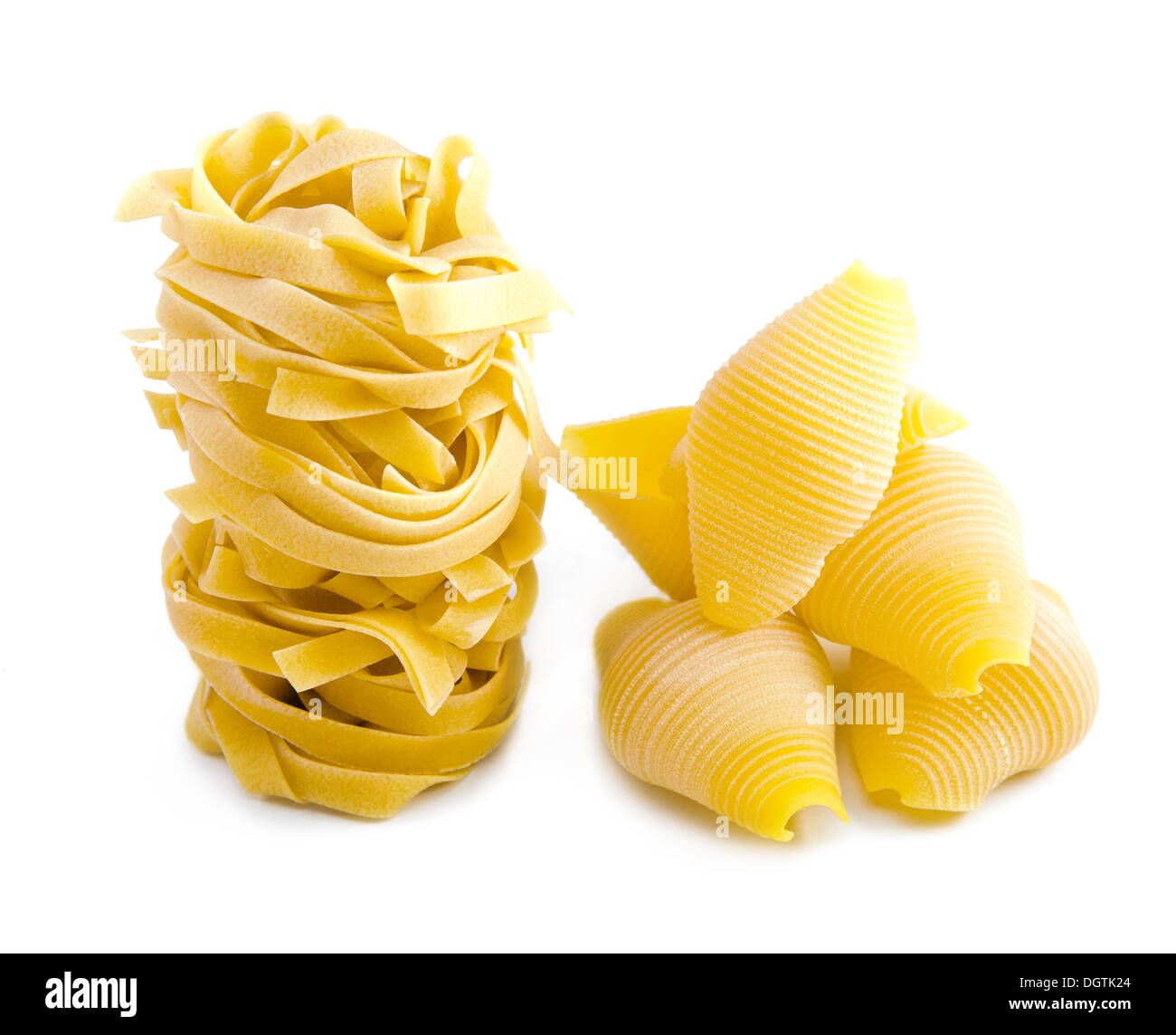 Dry pasta nests and Shell Pasta Stock Photo - Alamy