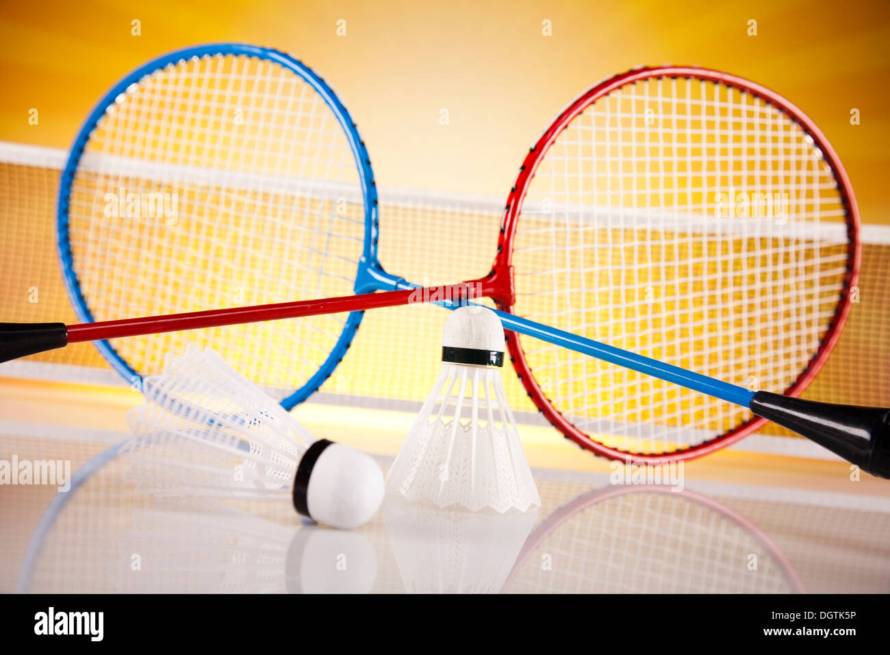 Badminton rackets and shuttlecock, sunshine background Stock Photo - Alamy