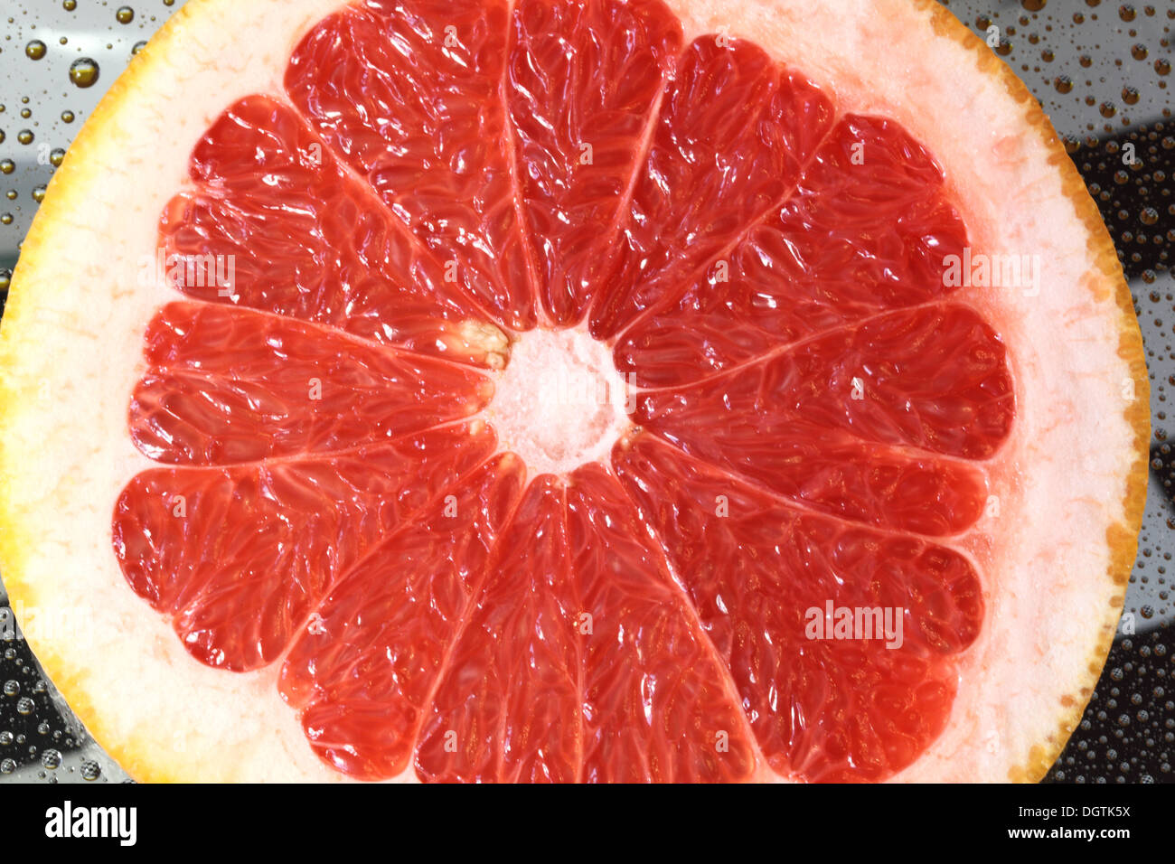 On a photo red grapefruit pulp Stock Photo - Alamy