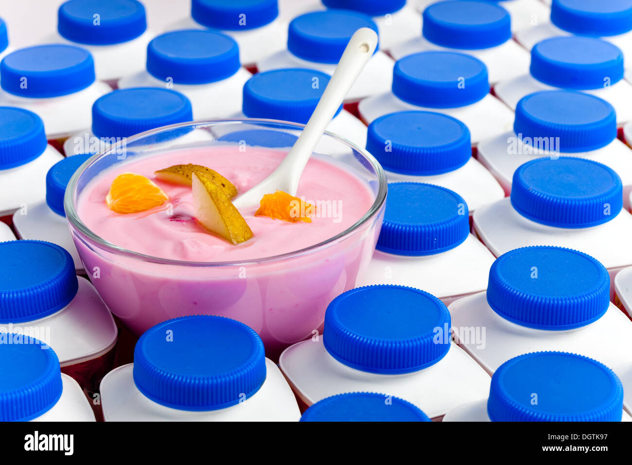 yogurt bottles with dark blue covers Stock Photo - Alamy