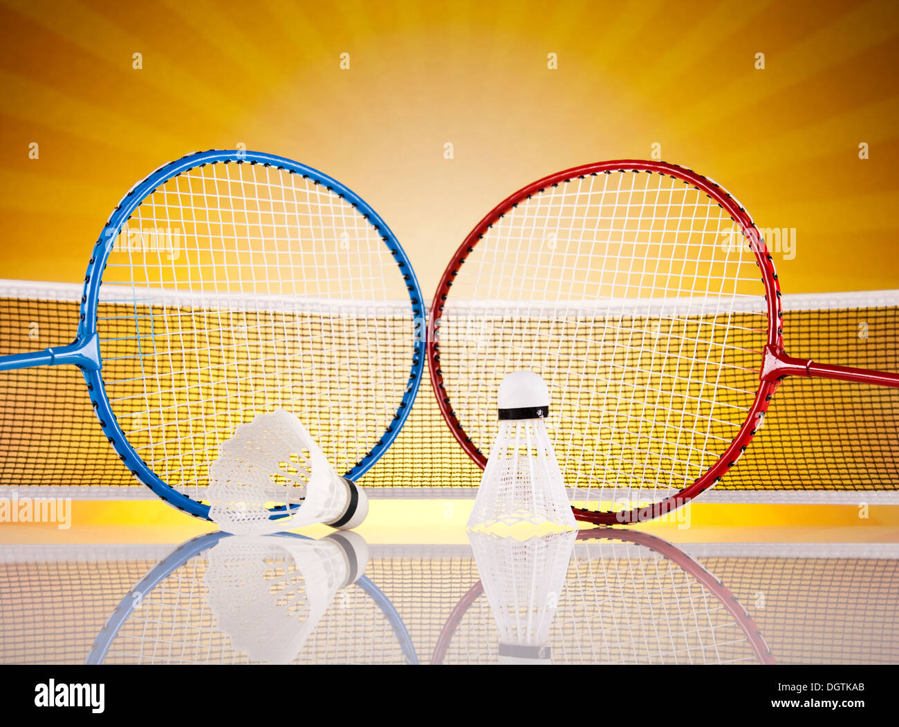 Badminton rackets and shuttlecock, sunshine background Stock Photo - Alamy