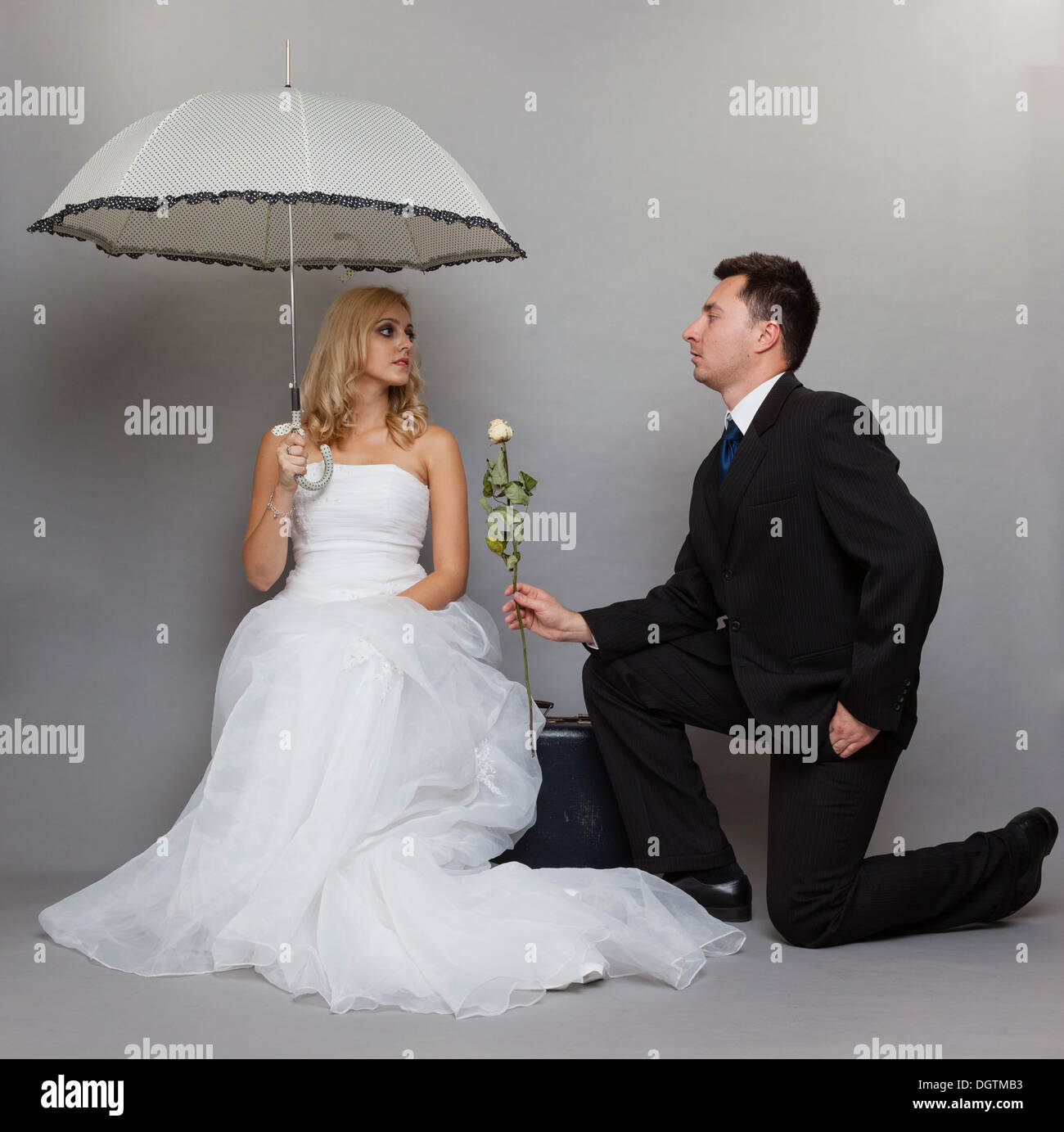 Wedding day. Portrait of romantic married couple blonde bride with ...