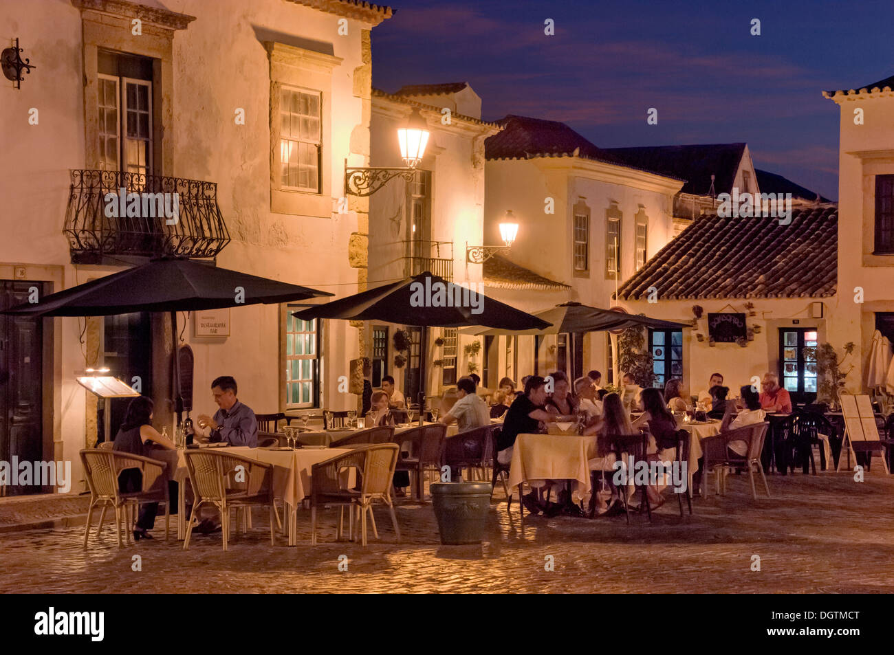 Portugal, Faro old town centre, a street restaurant in the evening ...