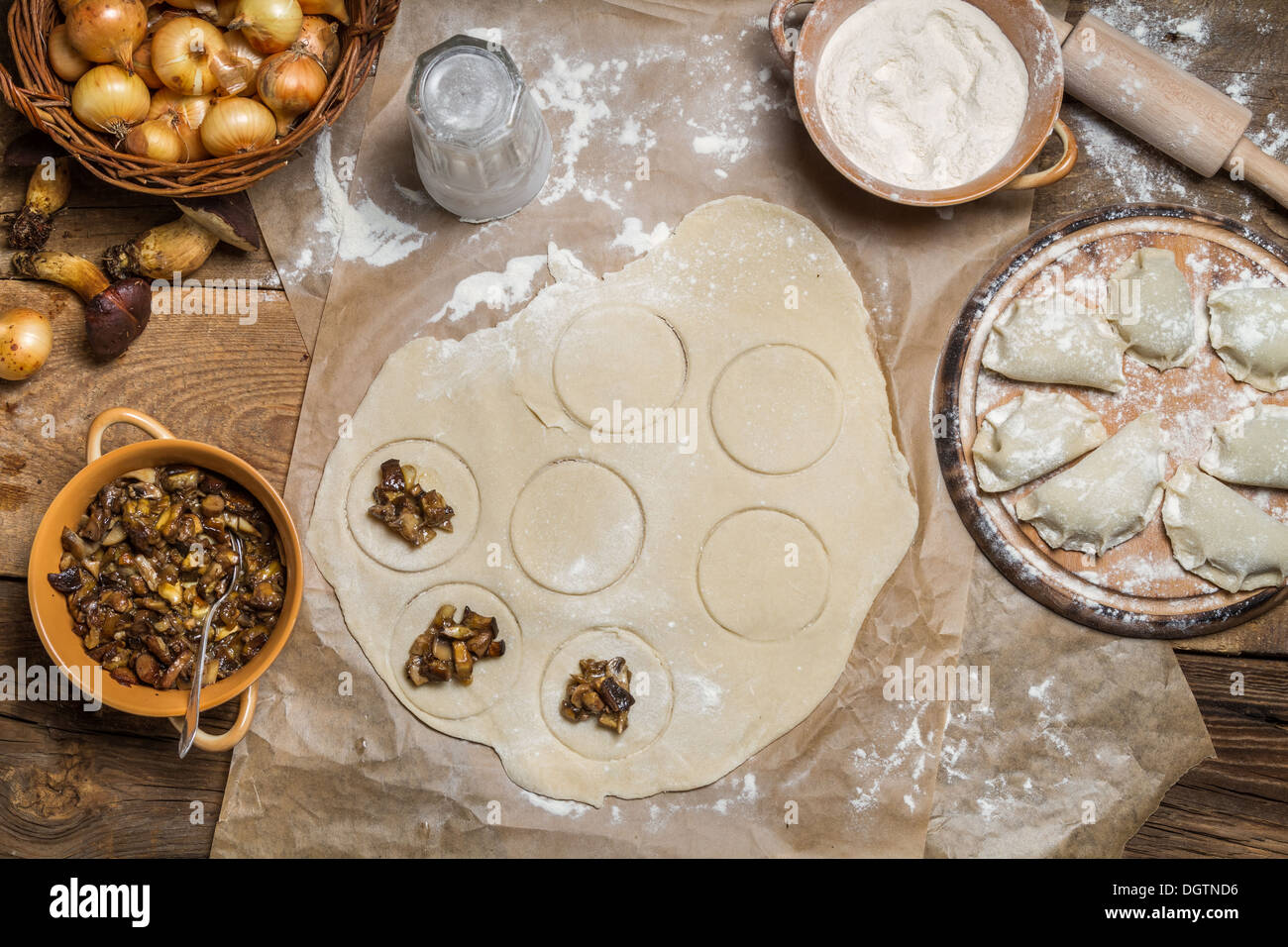 Preparing to cook homemade dumplings Stock Photo - Alamy