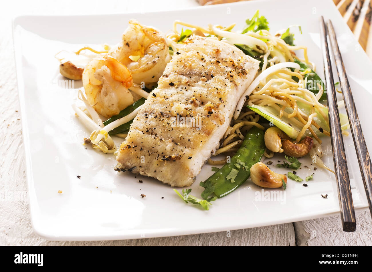 Fish with noodles hi-res stock photography and images - Alamy