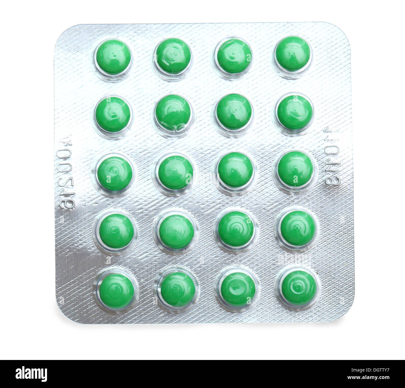 Packing green pills on white background Stock Photo - Alamy