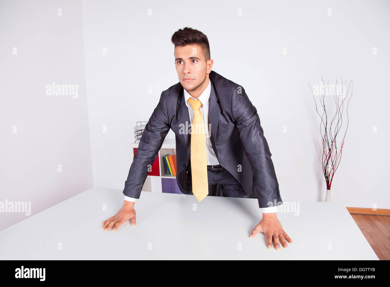 Modern and powerful businessman at his office Stock Photo - Alamy