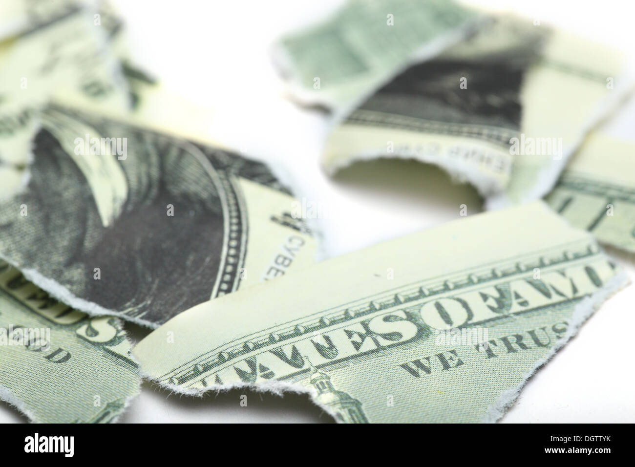 torn pieces of Dollar bill Stock Photo - Alamy