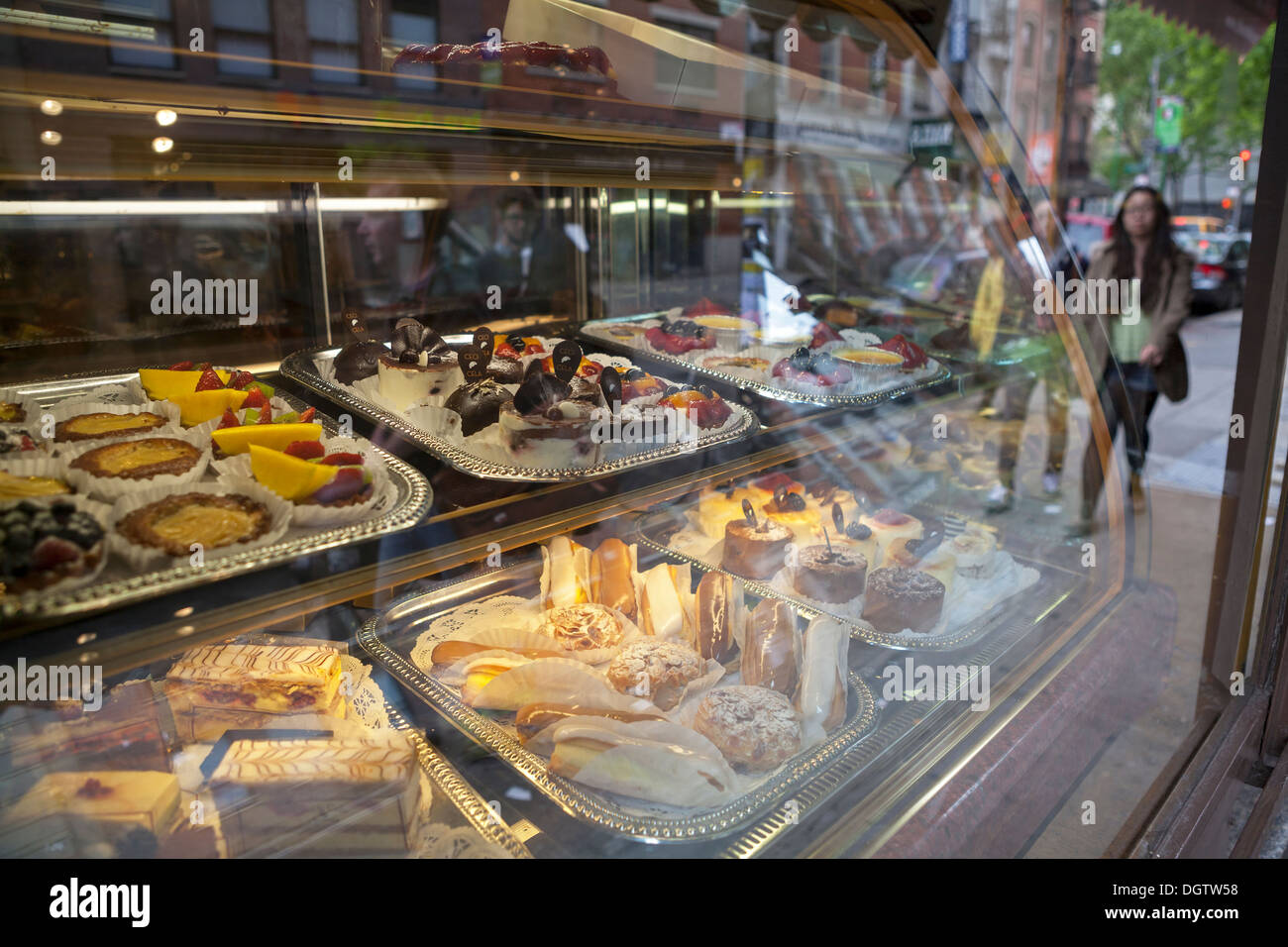 A bakery in New York City displays its sweet treats for people passing ...