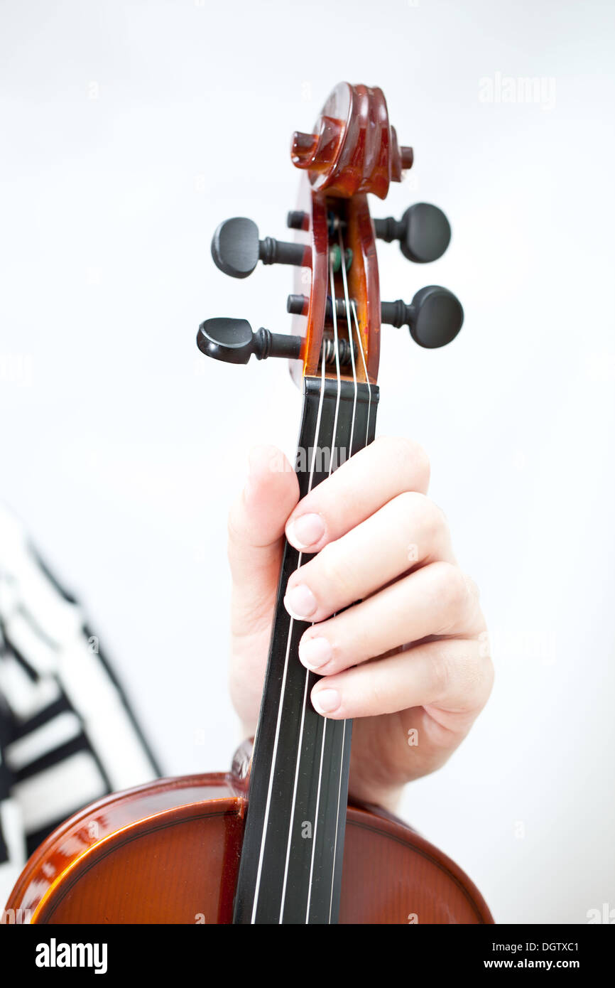 Woman hand with violin on white background Stock Photo - Alamy