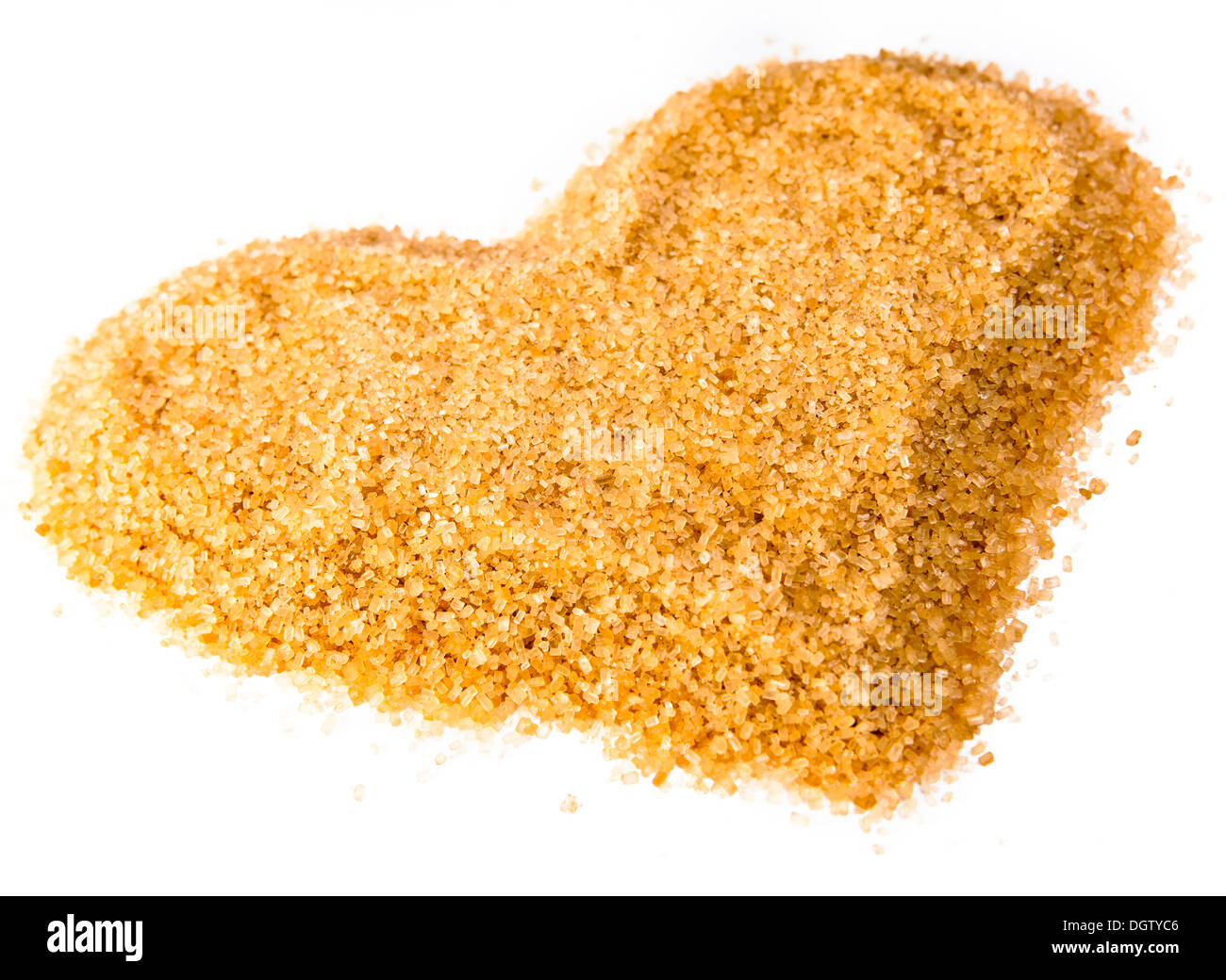 Heart from not refined reed granulated sugar Stock Photo - Alamy