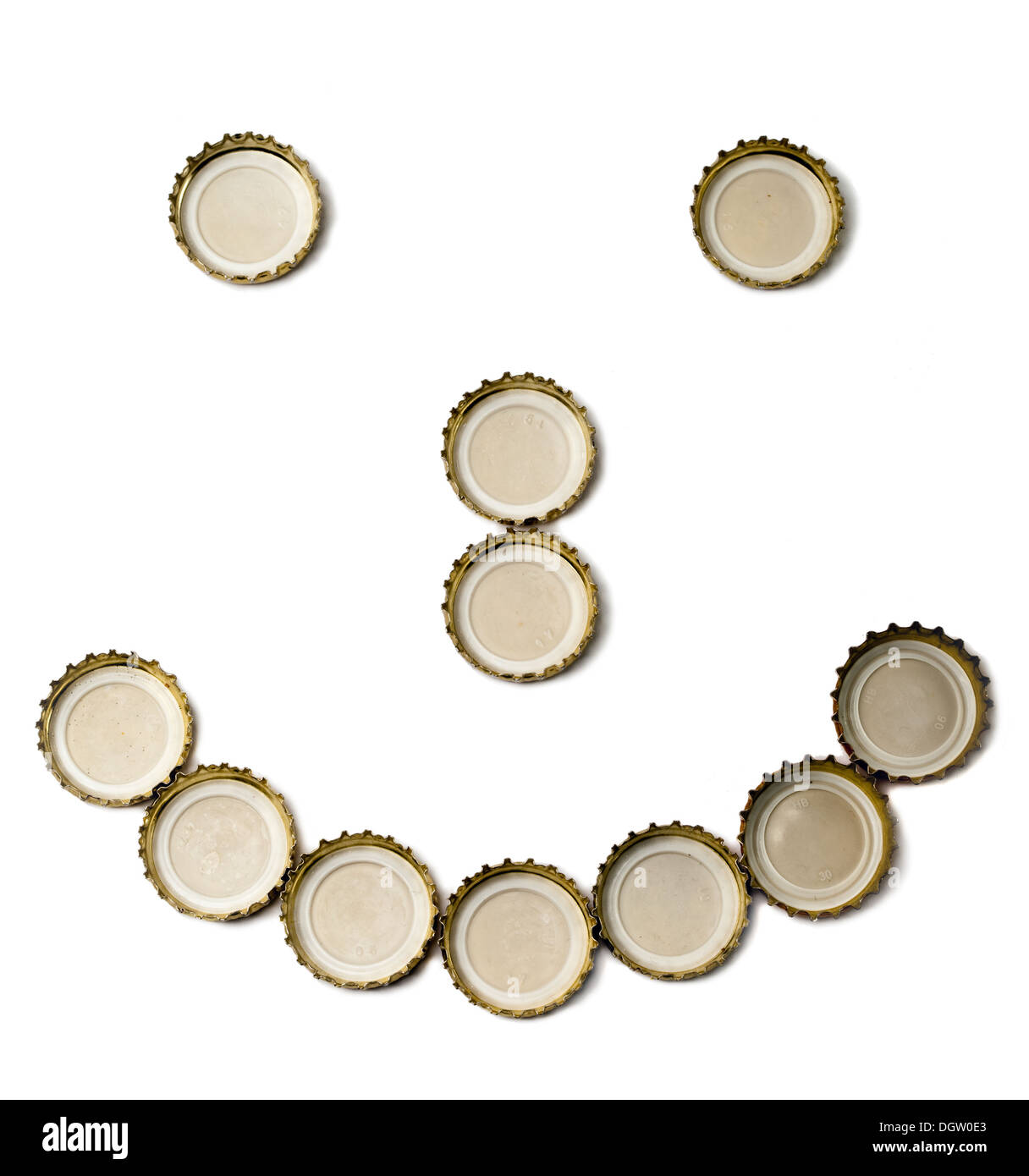 The face with a smile from beer covers Stock Photo - Alamy