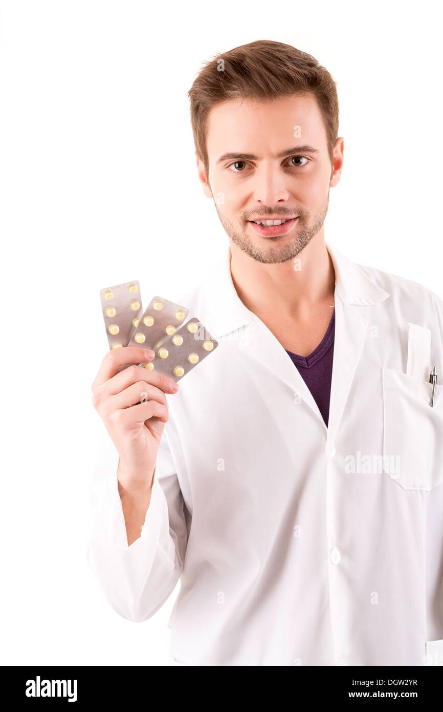 Doctor holding pills over hi-res stock photography and images - Alamy