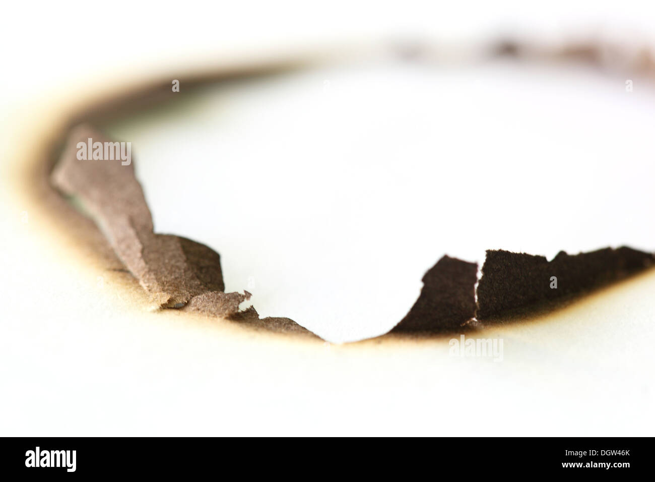 burned paper isolated on white Stock Photo - Alamy