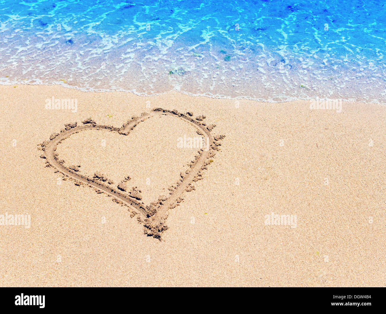 heart- a picture on sand Stock Photo - Alamy