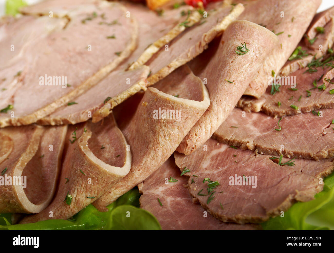 Beautiful sliced meat arrangement Stock Photo - Alamy