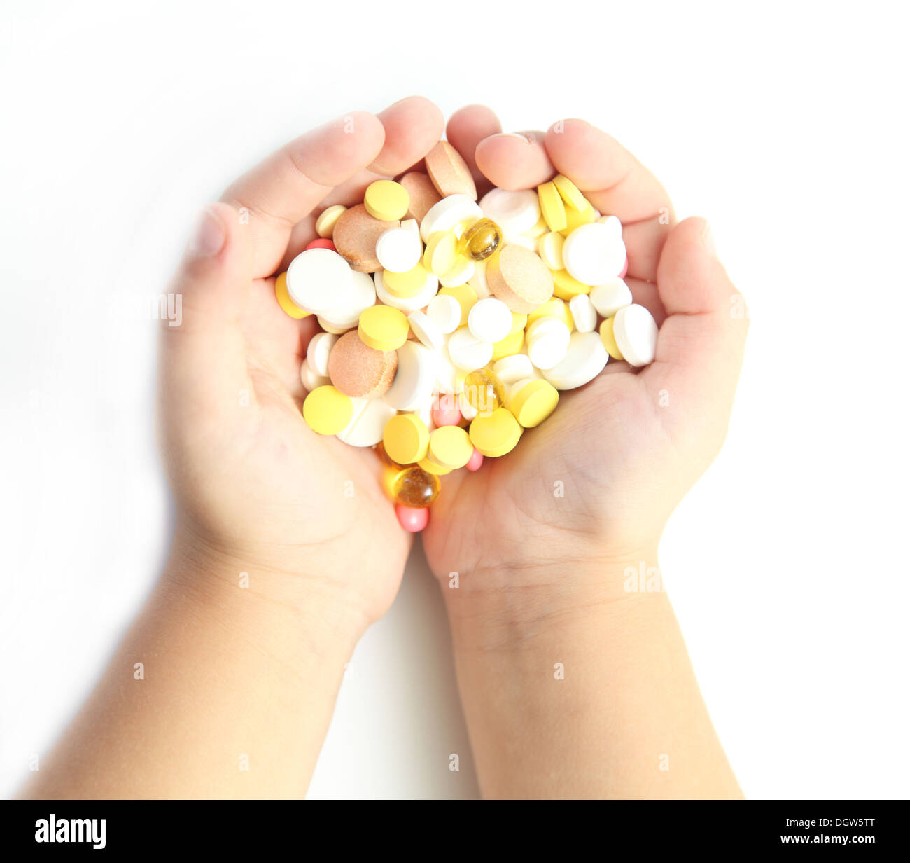 tablets in a child's hand Stock Photo - Alamy